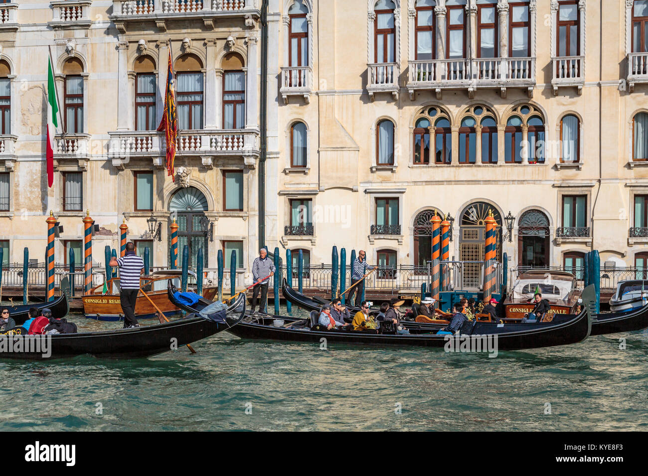 Canal side buildings and gondolas along the Grand Canal in Veneto ...