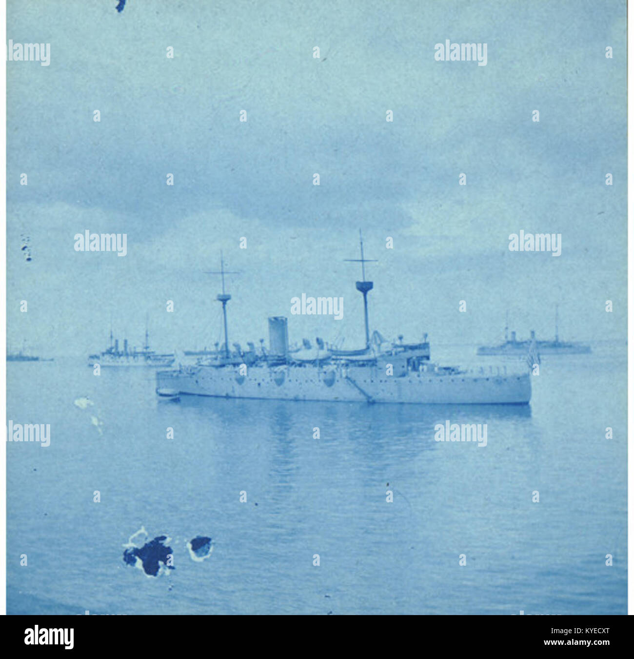 The USS Charleston is anchored in Nagasaki harbor, Japan, around 1899 ...