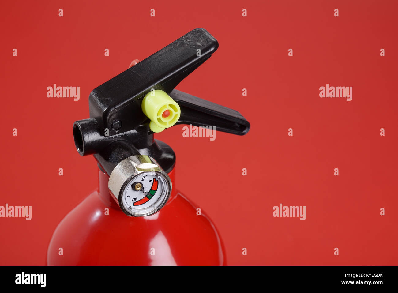 Close up detail of the top of a small domestic fire extinguisher Stock ...