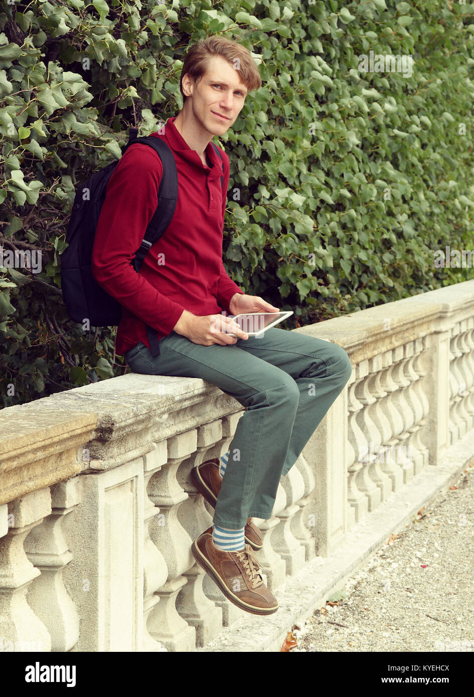 young man using tablet computer Stock Photo - Alamy young man using tablet computer Stock Photo - Alamy