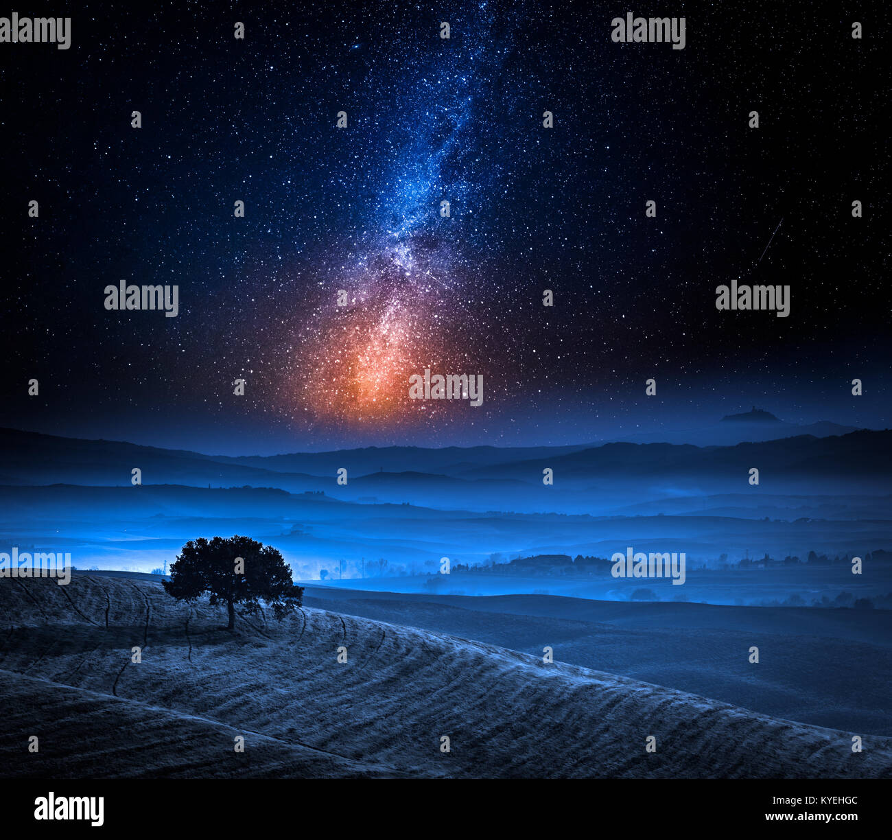 Dreamland in Tuscany with tree on field and milky way Stock Photo - Alamy