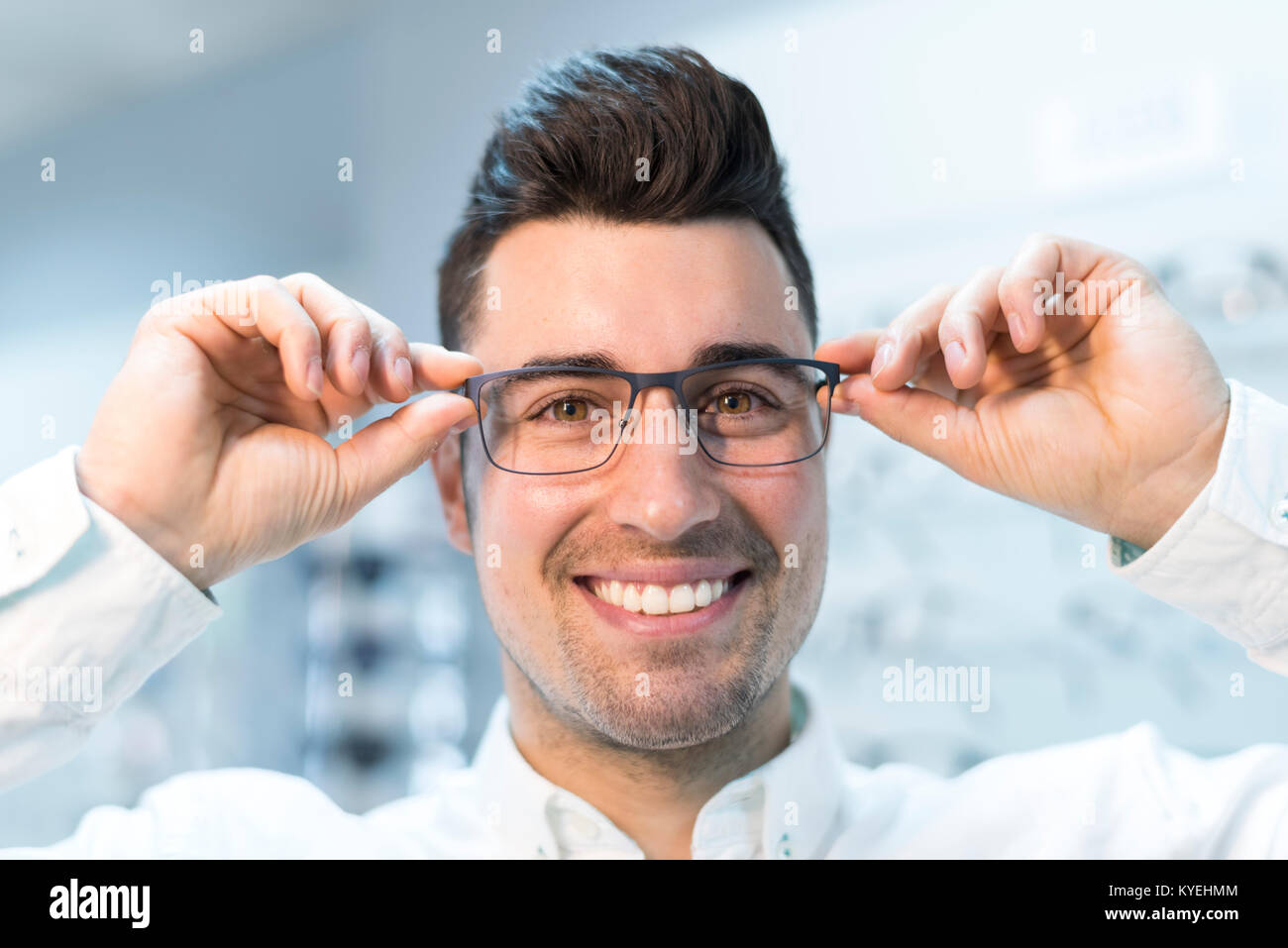 Man Trying On Glasses High Resolution Stock Photography and Images - Alamy
