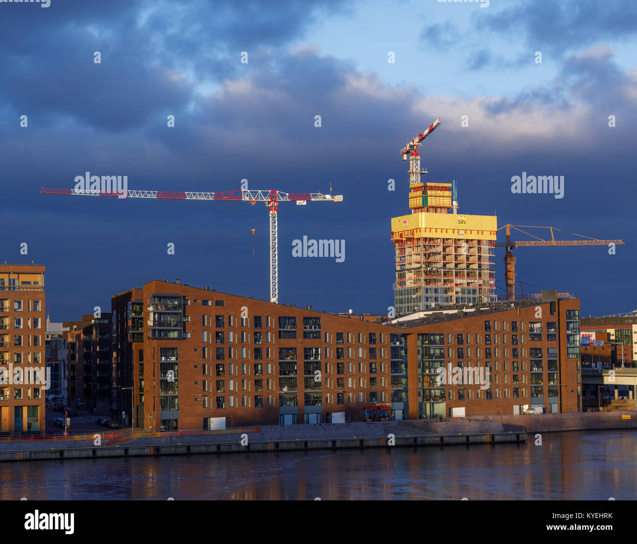 High-rise building Redi under construction with a crane beside it at ...