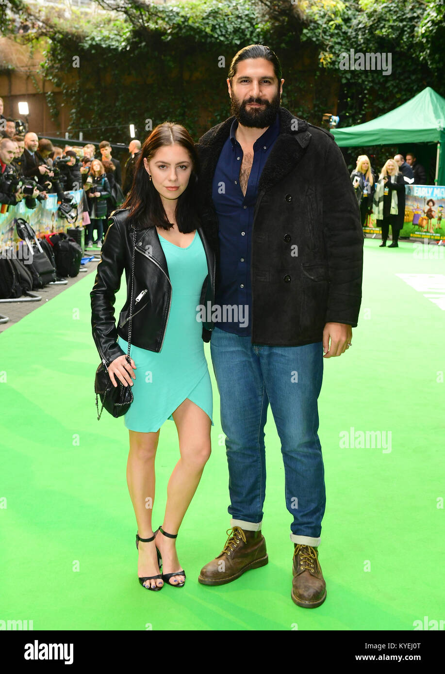 Kayvan Novak and guest attending the Early Man World Premiere held at ...