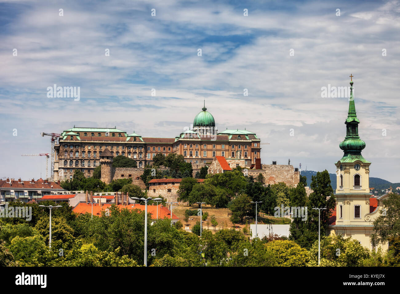 Buda Castle and bell tower of Taban Parish Church in Budapest, Hungary ...