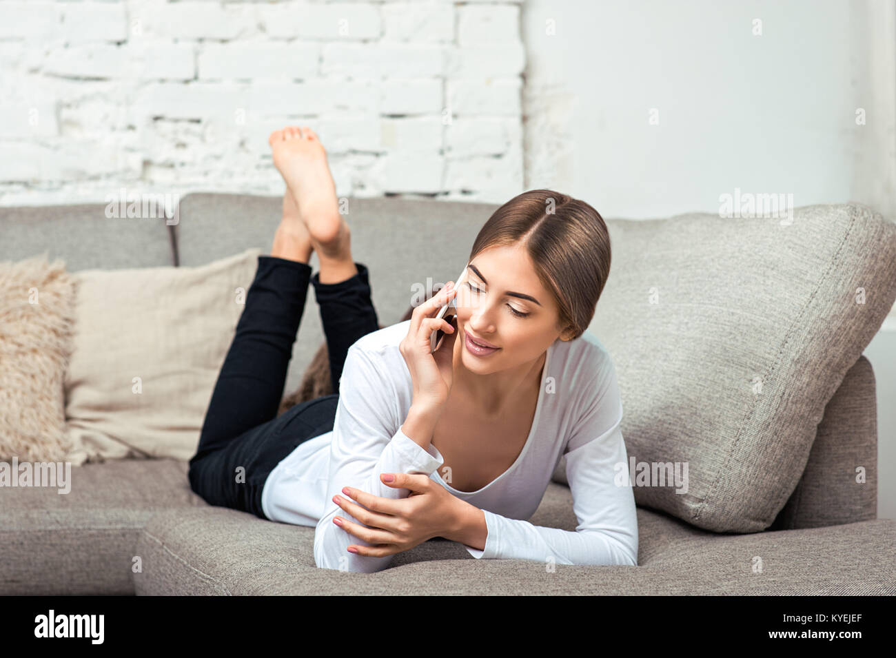Laying lifestyle hi-res stock photography and images - Alamy