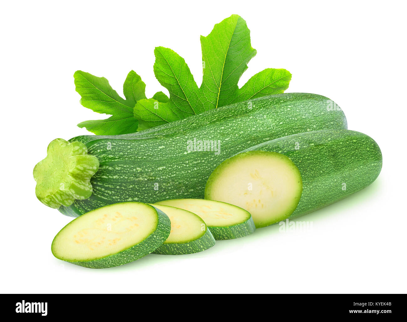 Isolated courgettes. One whole and sliced zucchini fruits isolated on ...