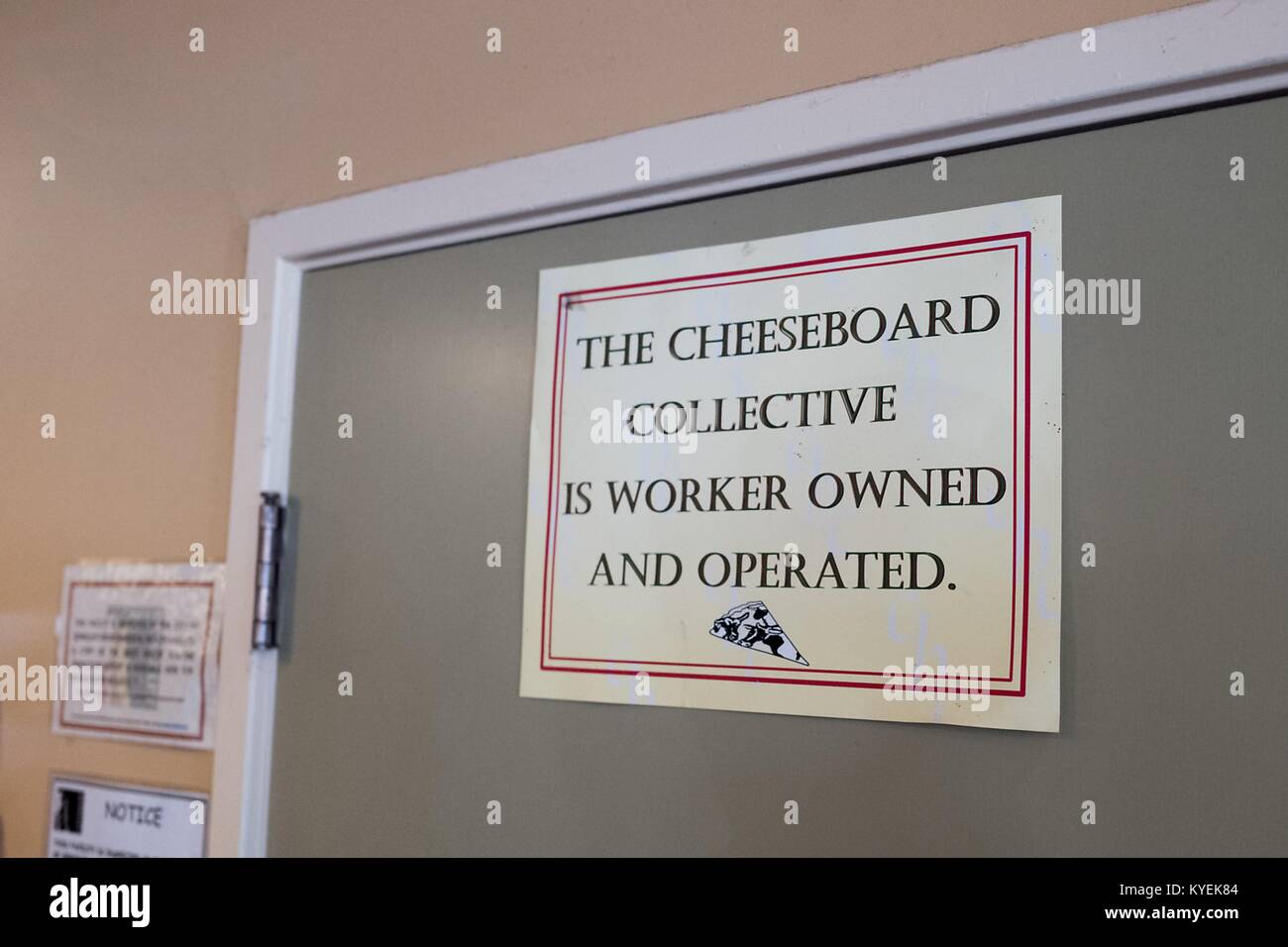 Sign indicating that the Cheeseboard cheese shop and Cheeseboard Pizza ...