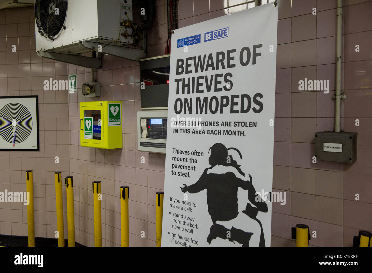 A metropolitan police poster in Old Street tube station warning about ...