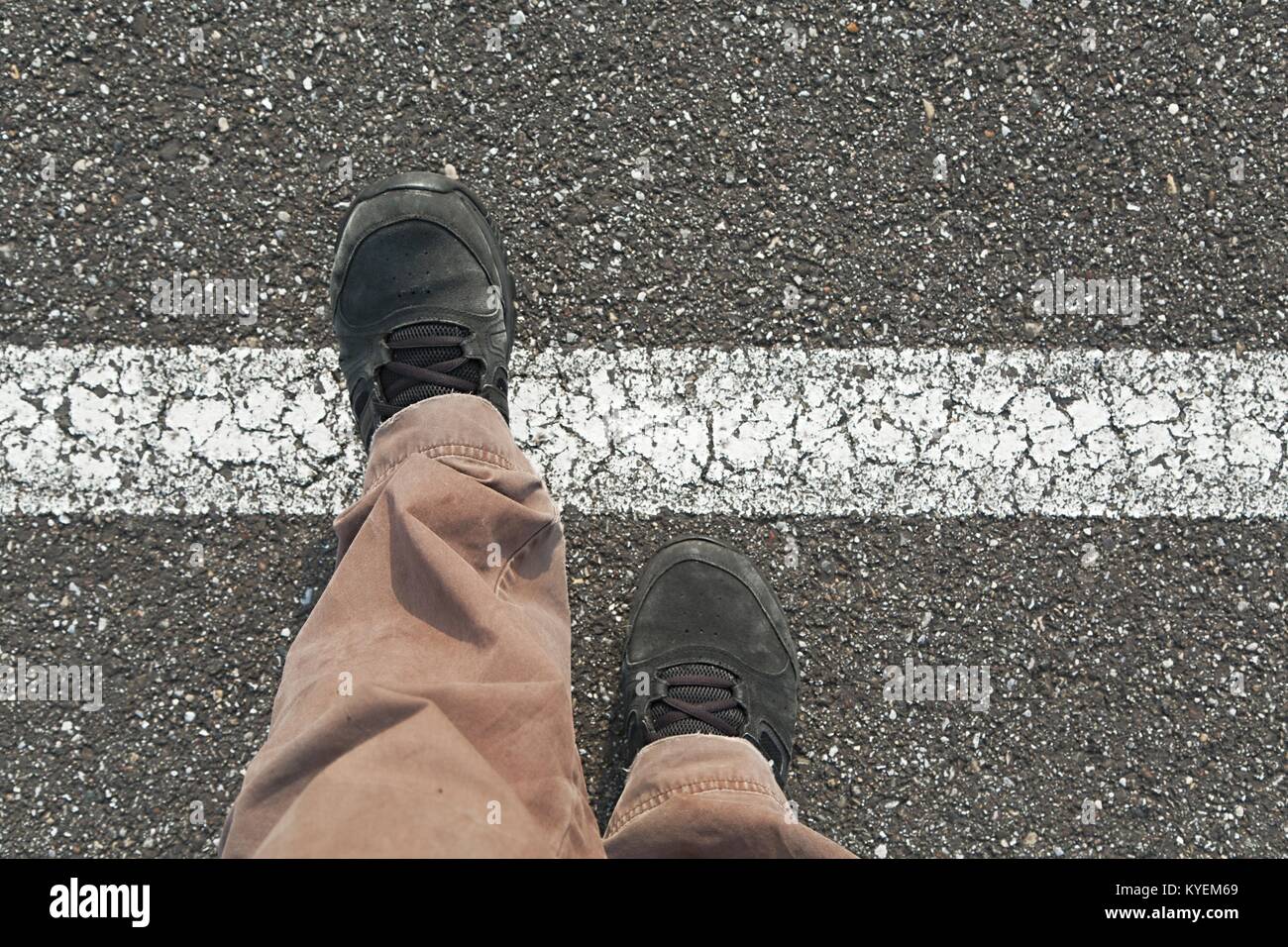 Stepping over the line Stock Photo - Alamy