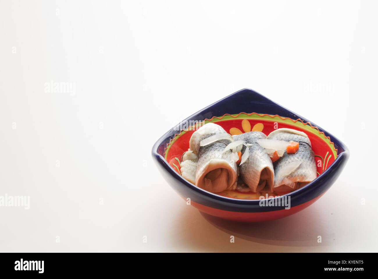 lovely dish of rollmop herring Stock Photo - Alamy