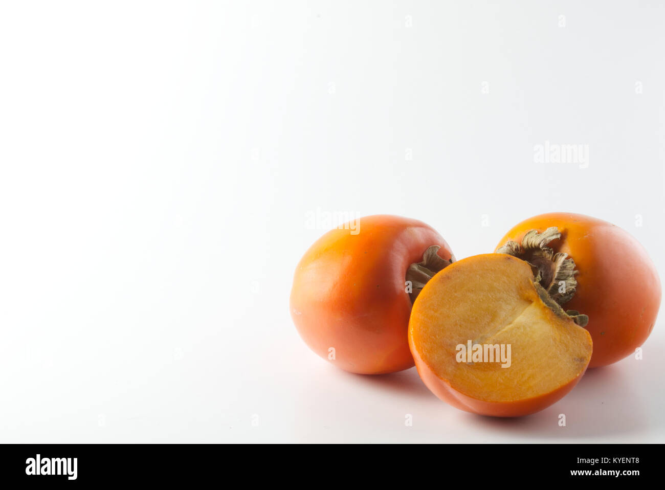 sharon fruit one of the five a day Stock Photo - Alamy
