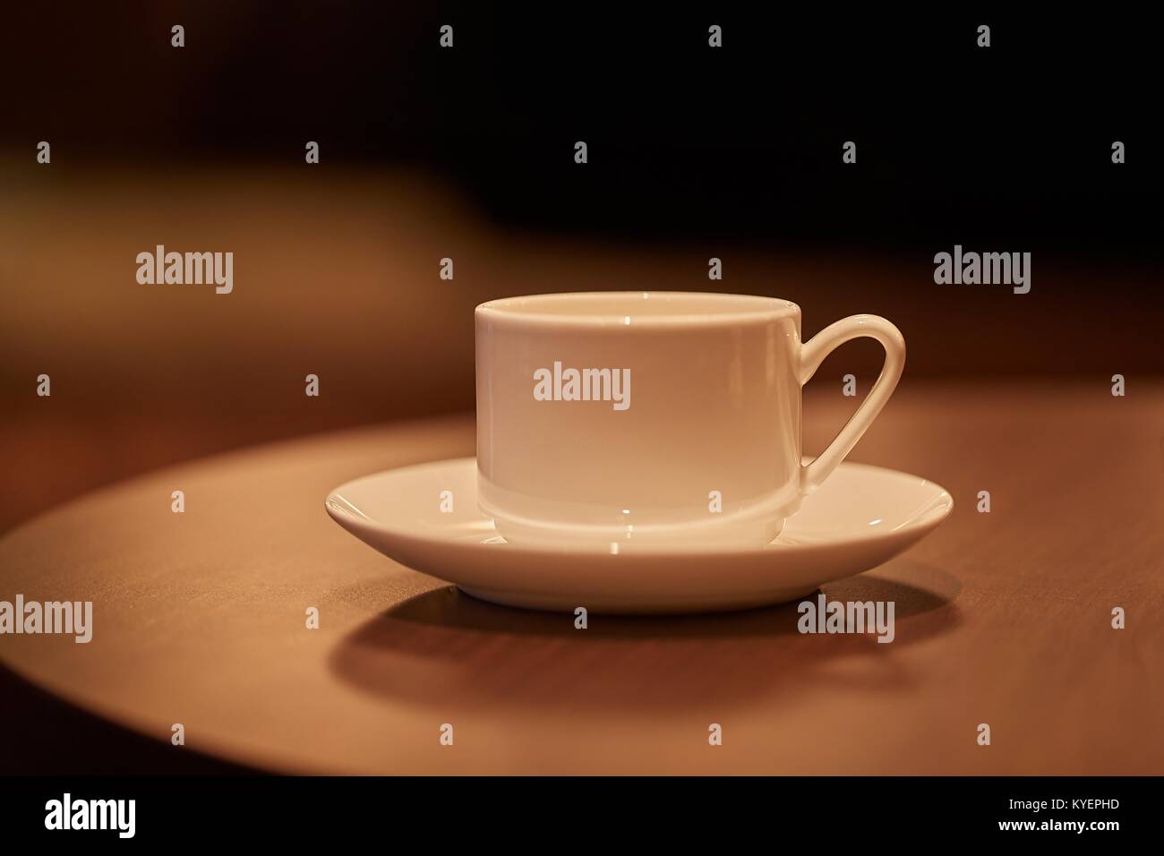 Coffee cup on table Stock Photo - Alamy