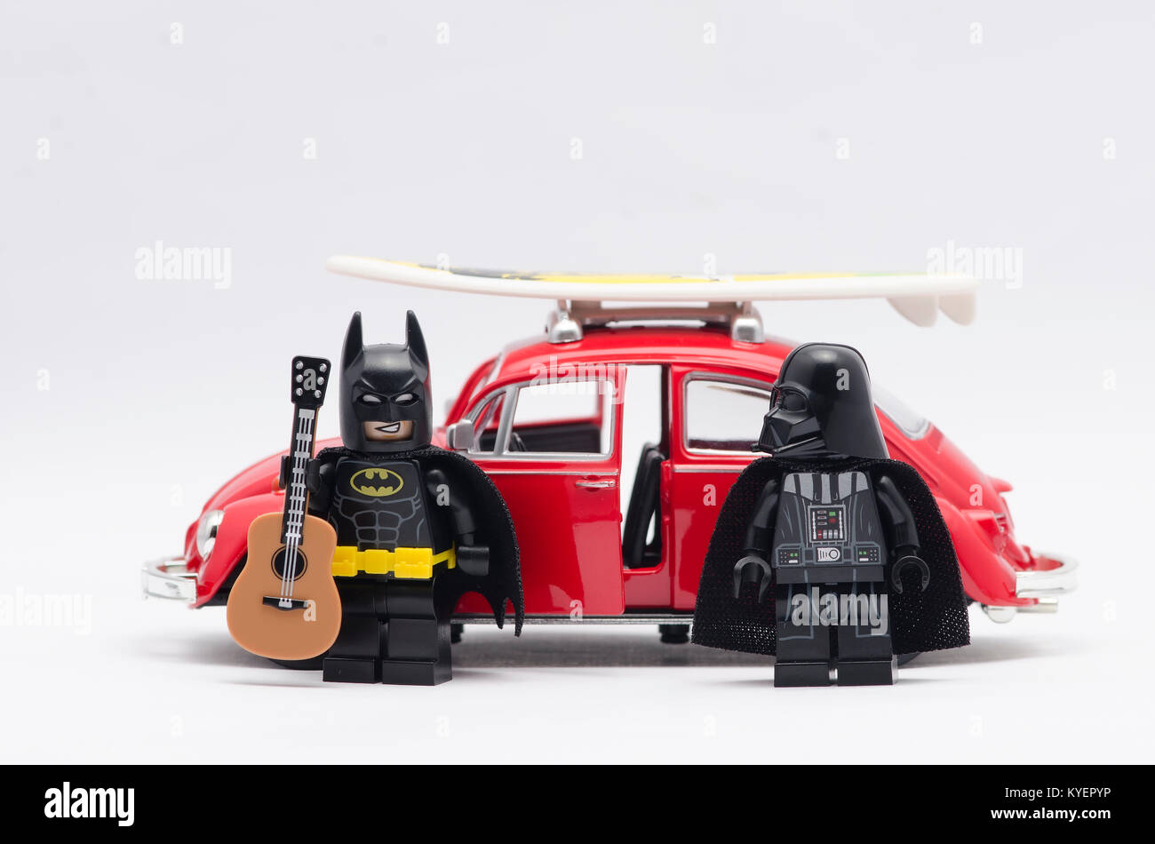 lego batman holding a guitar with darth vader and a volkswagen car ...
