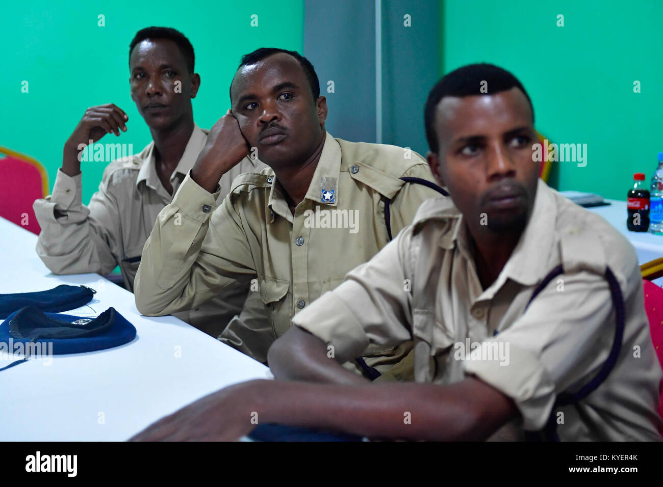 Somali police officers attending the joint closing ceremony for the ...