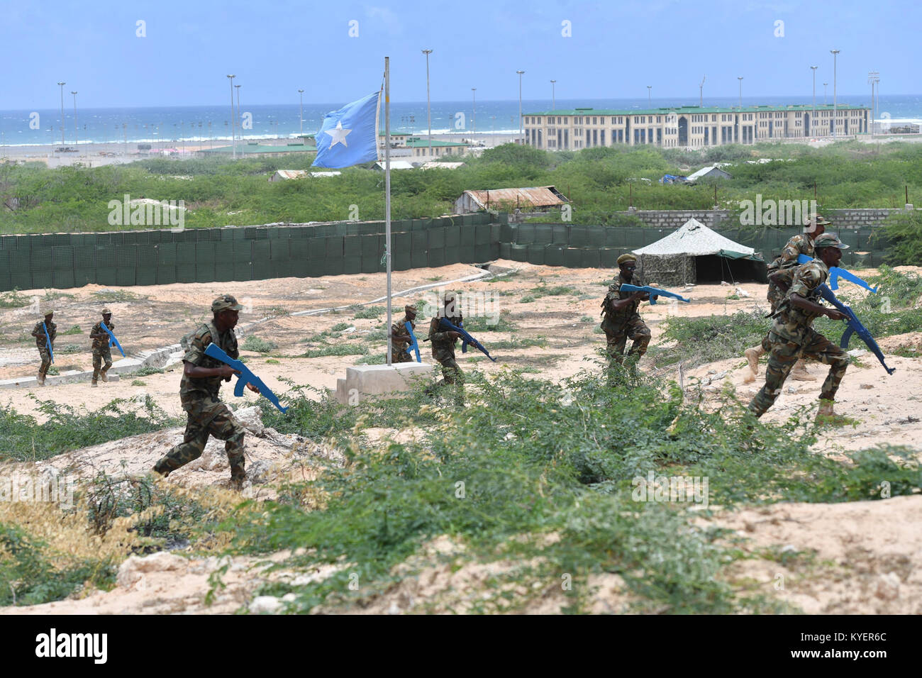 Somali National Army soldiers demonstrate field military tactics during ...