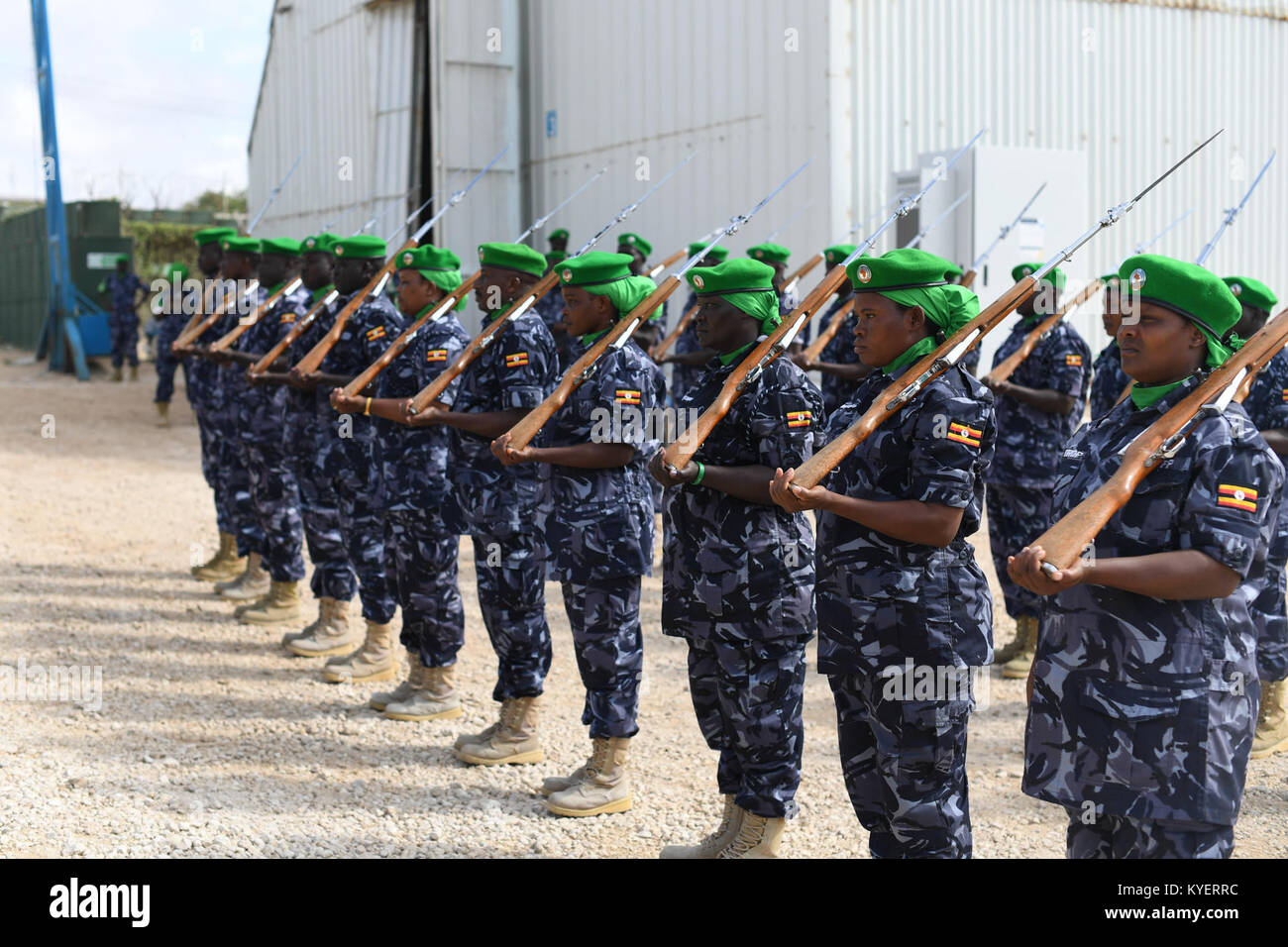 Ugandan police personnel, serving under AMISOM, on parade during a ...