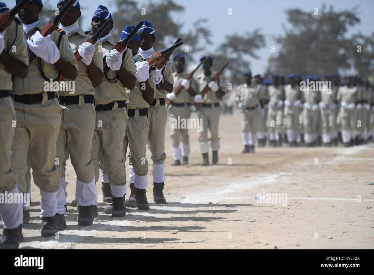 Somali police officers march during a parade at a ceremony held to mark ...