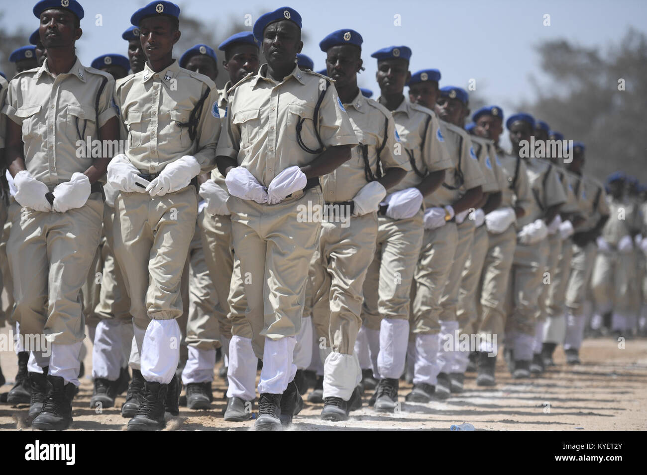 Somali police officers march during a parade at a ceremony held to mark ...