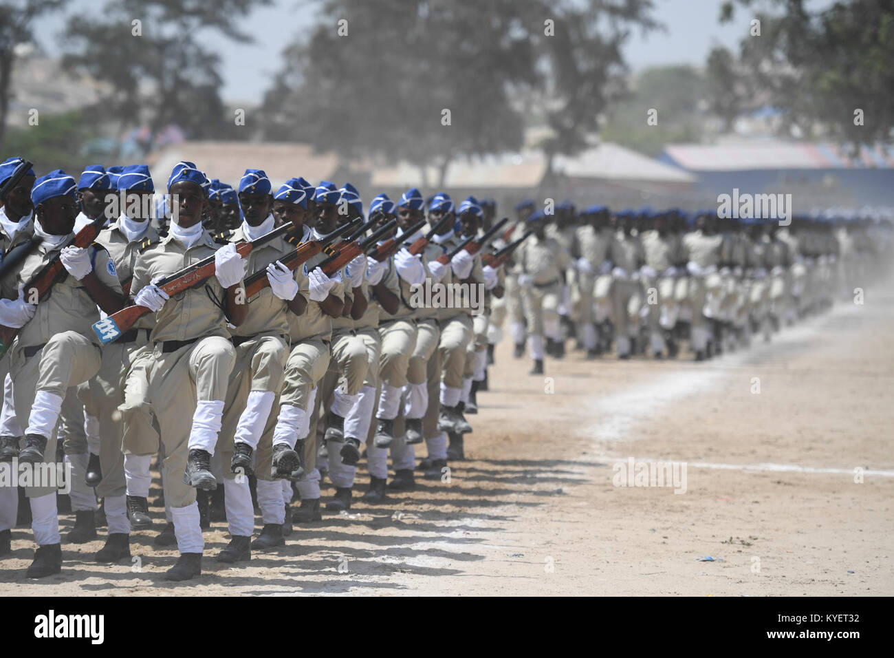 A photograph of Somali police officers marching during a ceremony at ...