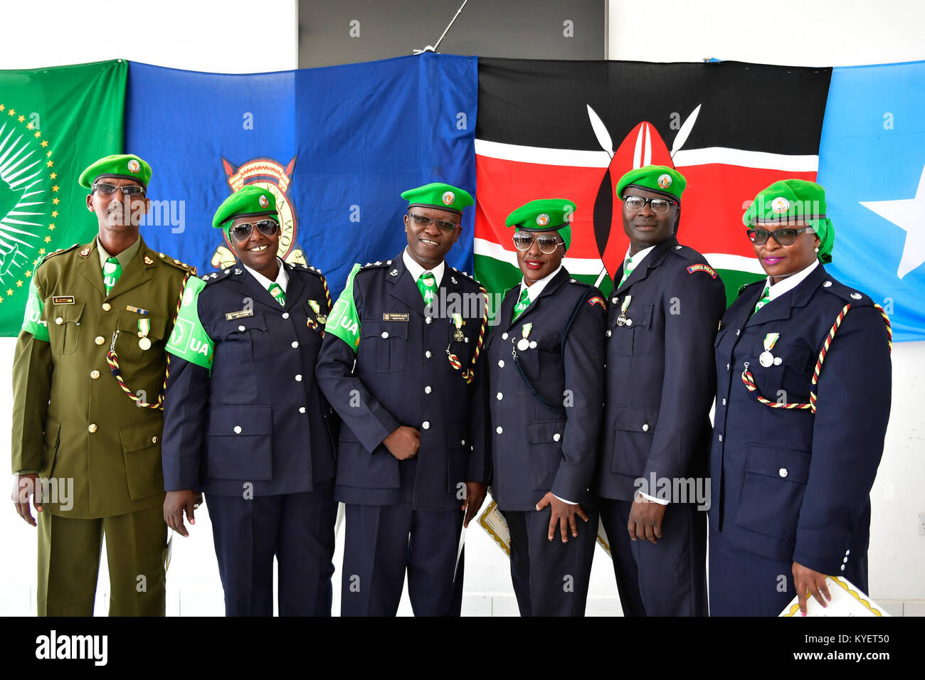A photograph of Kenyan police officers completing their tour of duty ...