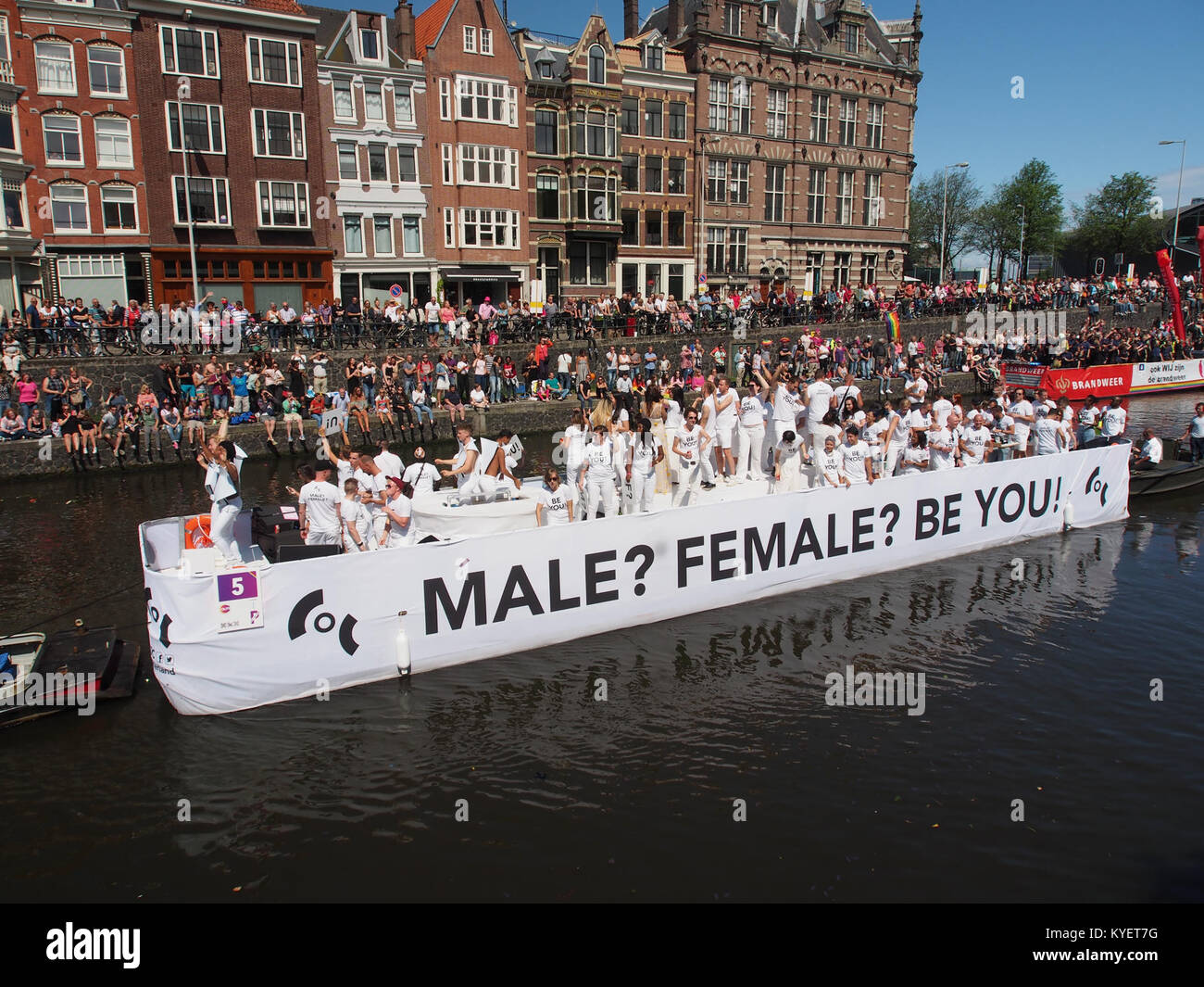 A boat named 'Male, Female, Be You' participates in the Canal Parade ...
