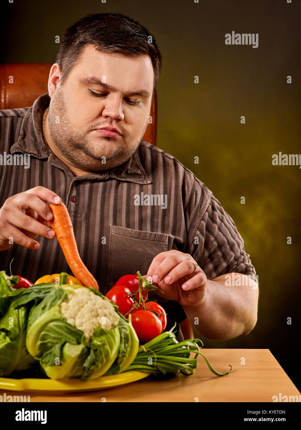 Diet fat man eating healthy food. Healthy breakfast vegetables ...