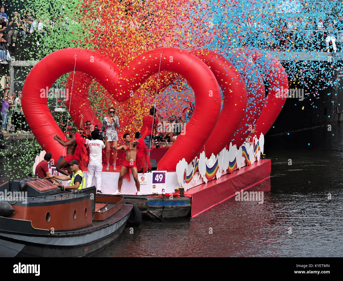 This image captures Boat 49 of the Vodafone float during the Canal Parade in Amsterdam, 2017 ...