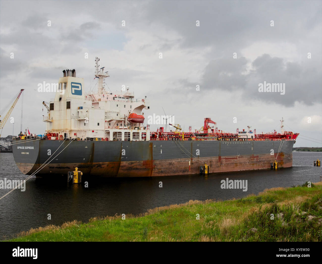 The image shows the Spruce Express ship, IMO number 9354258, docked at ...