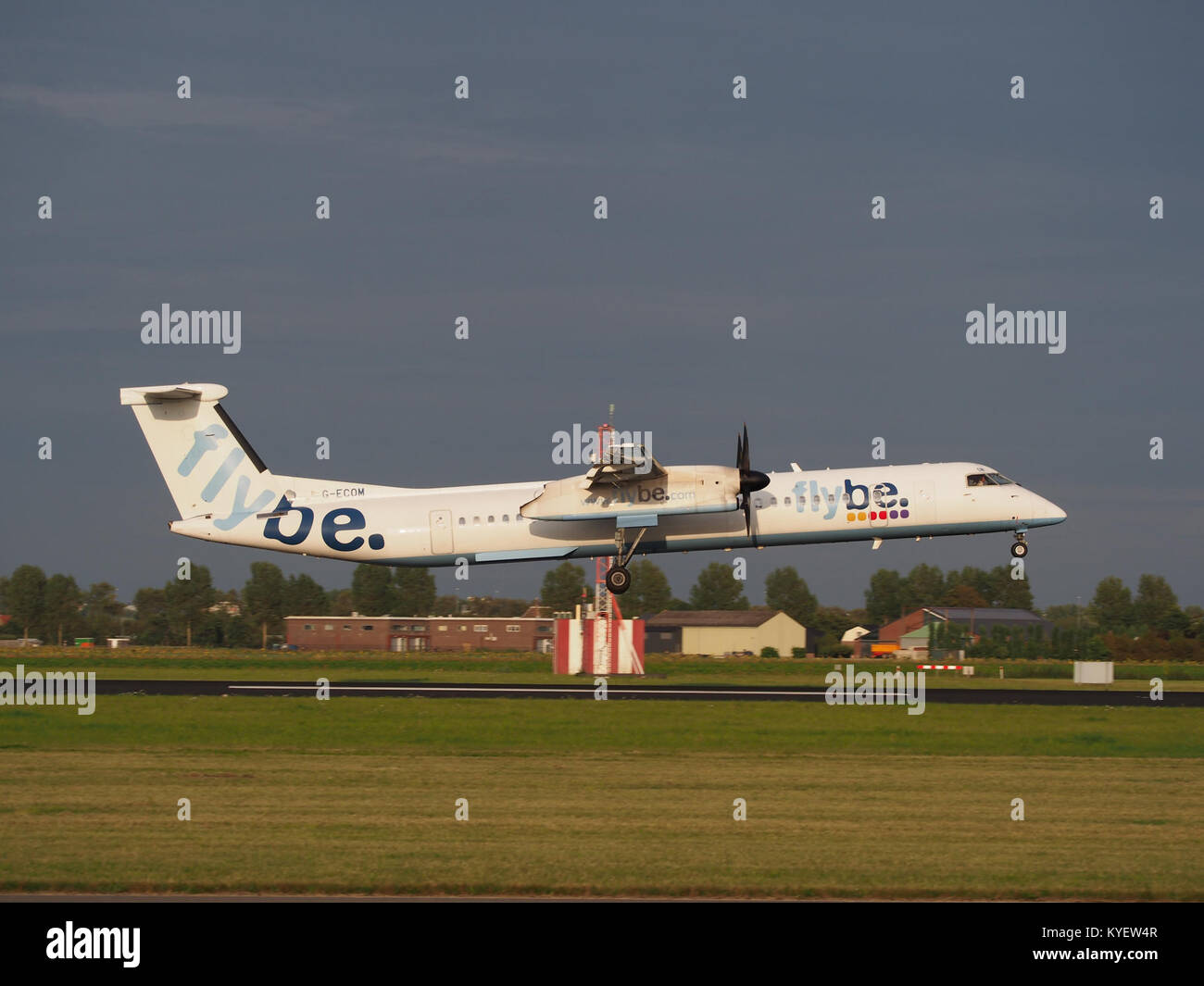 The Flybe-operated De Havilland Canada DHC-8-402Q Dash 8 with registration G-ECOM lands on ...
