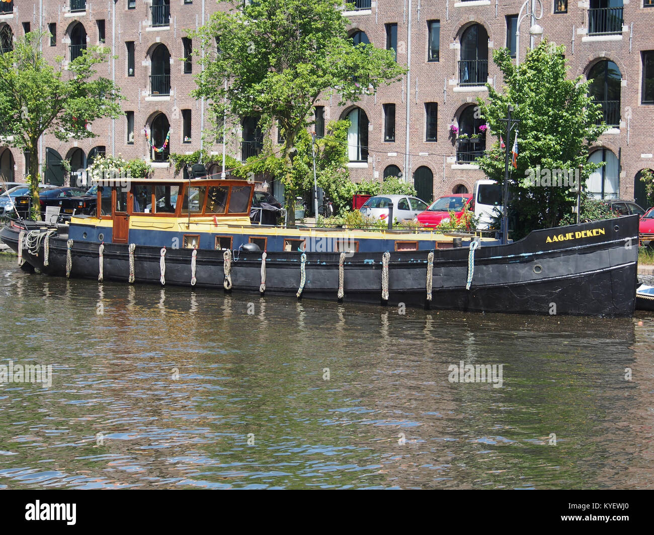 A photograph of a barge at Entrepotdok, a historic dock area in ...
