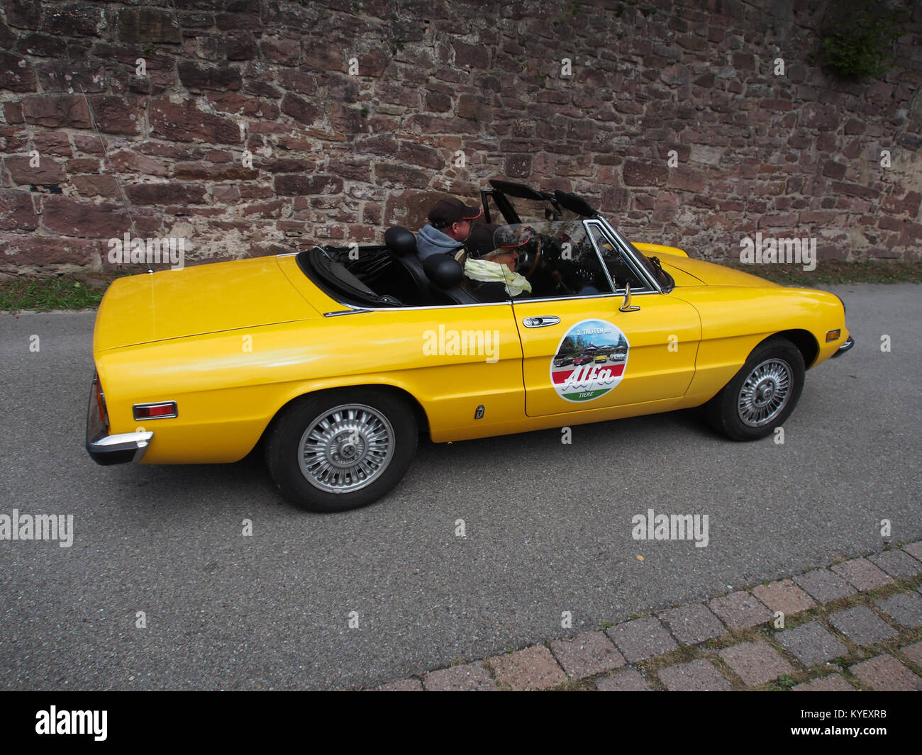 The image features an Alfa Romeo participating in the 2017 'Rund ums ...