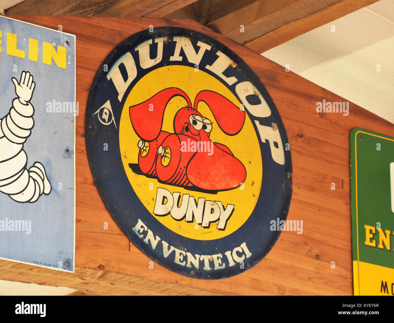 A vintage enamel advertisement sign for Dunlop Dunpy, displayed at the ...