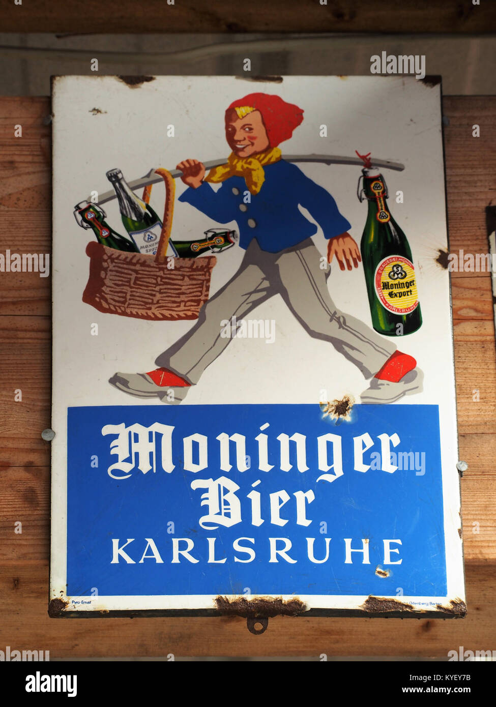 A vintage enamel advertising sign for Moninger Bier displayed at the ...