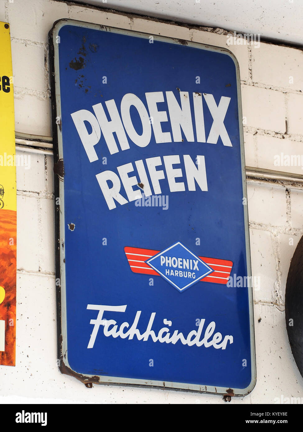 A vintage enamel advertisement for Phoenix Reifen (Phoenix Tires ...