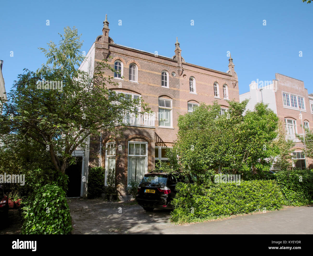 A photograph capturing the buildings at Middenweg 98-100, showing their ...