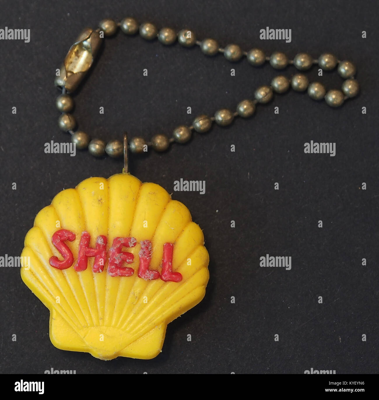 A vintage keychain featuring the Shell logo. The item represents ...