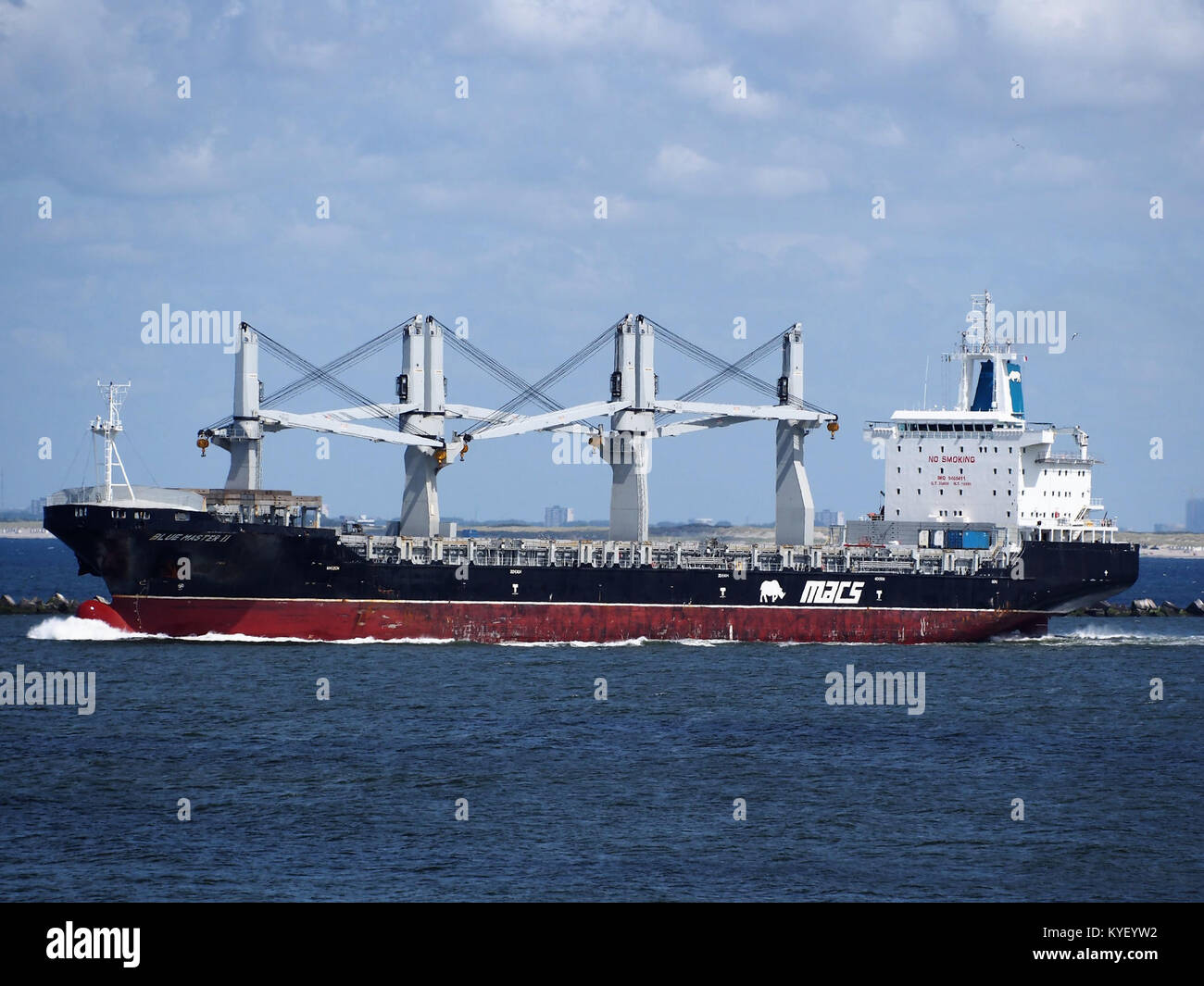 The Blue Master II, a modern cargo ship built in 2013, departs from the ...