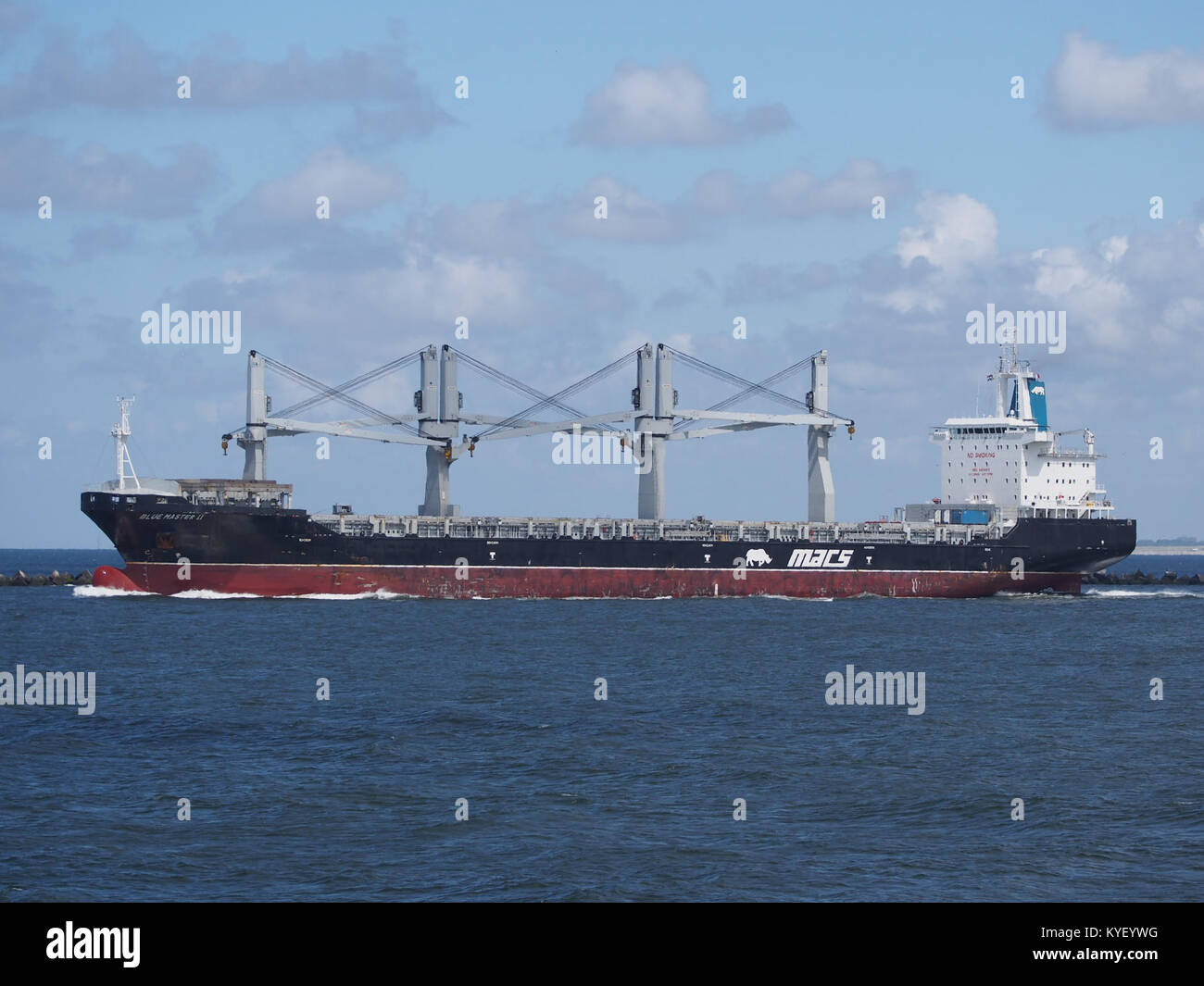 This image shows the Blue Master II, a ship leaving the Port of ...