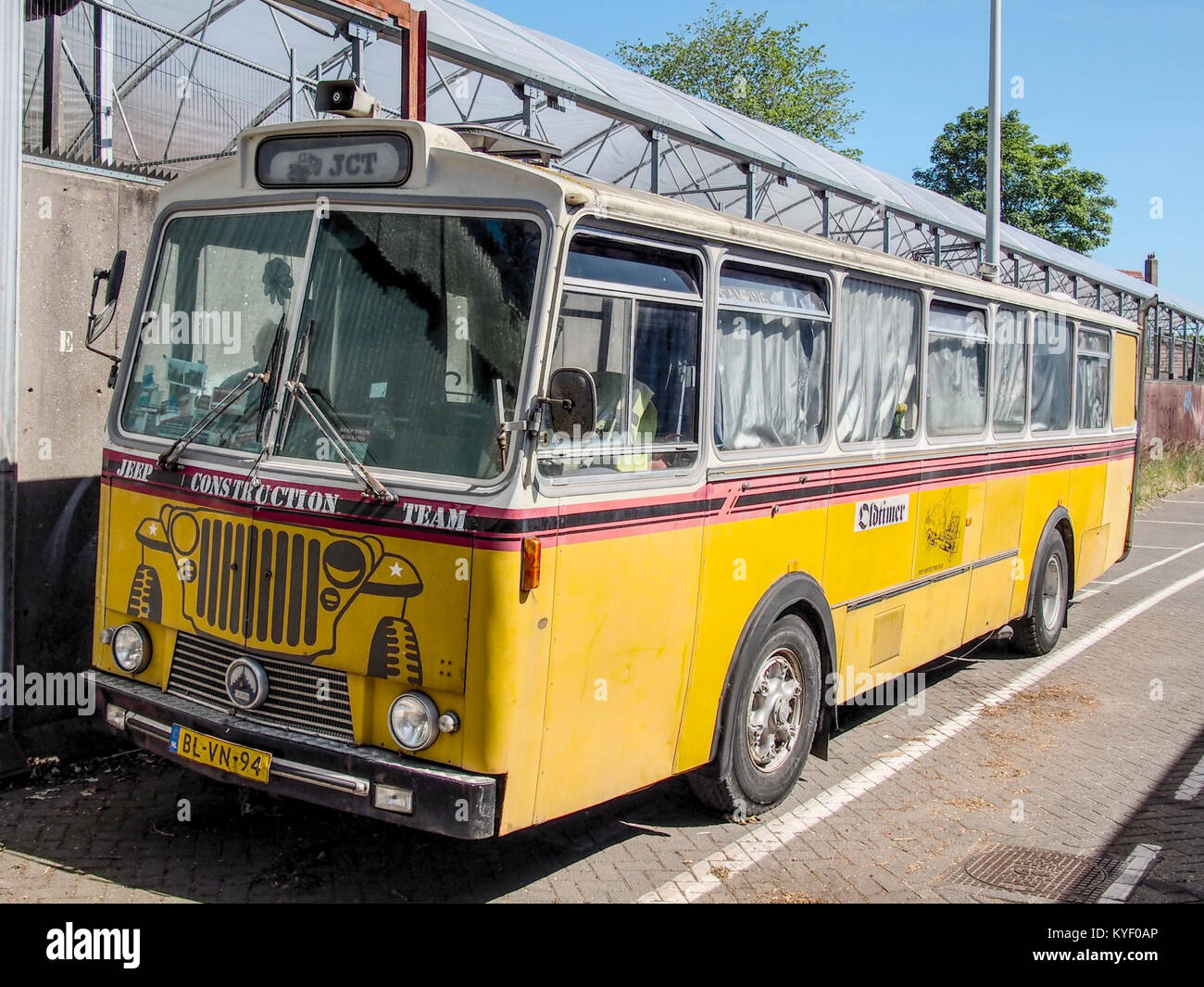 A photograph of a Jeep construction team bus, used for transporting ...