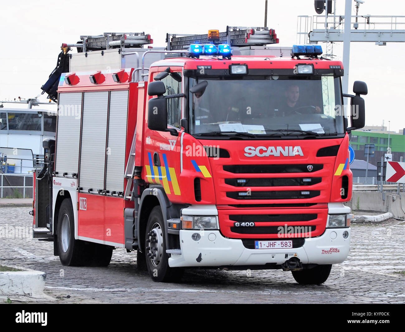 A photograph of a Scania G400 fire engine operating in the fire zone of ...