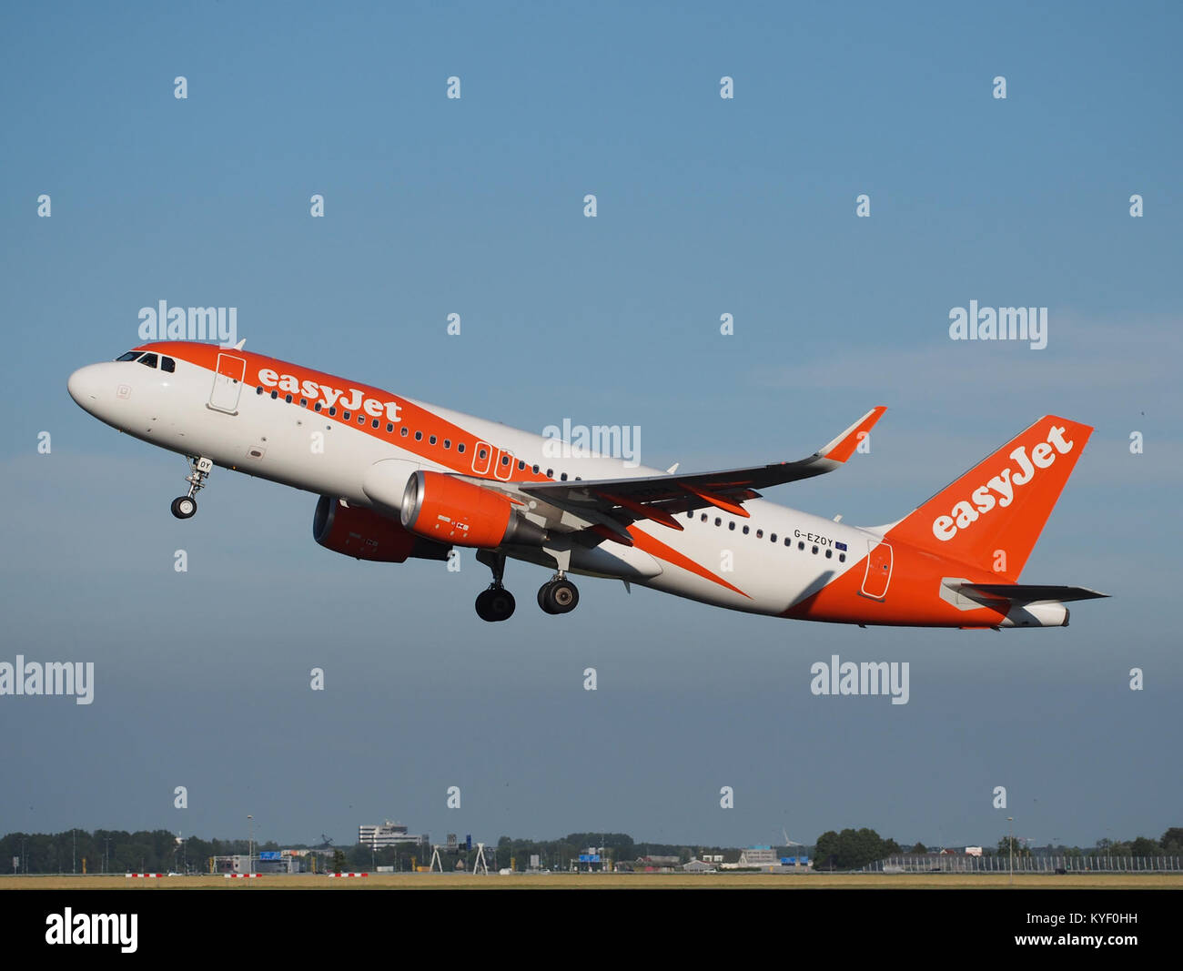 The easyJet Airbus A320-214 (registration G-EZOY) takes off from ...
