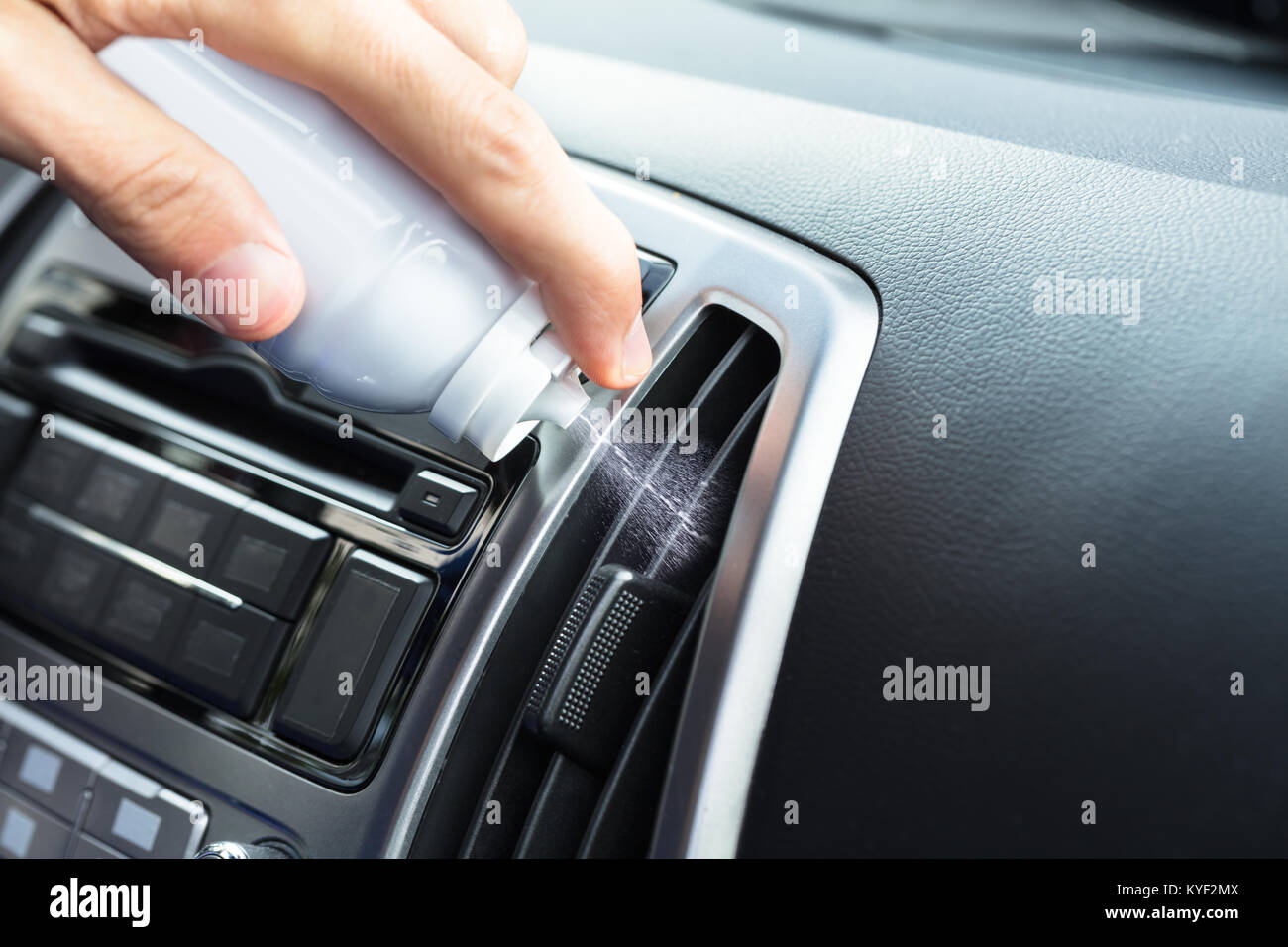 Person's Hand Cleaning Air Conditioner With Bottle In Car Stock Photo ...