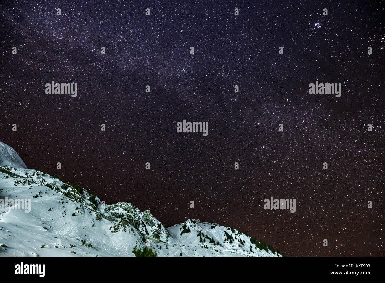 Winter time nightscape in the snowy mountains Stock Photo - Alamy