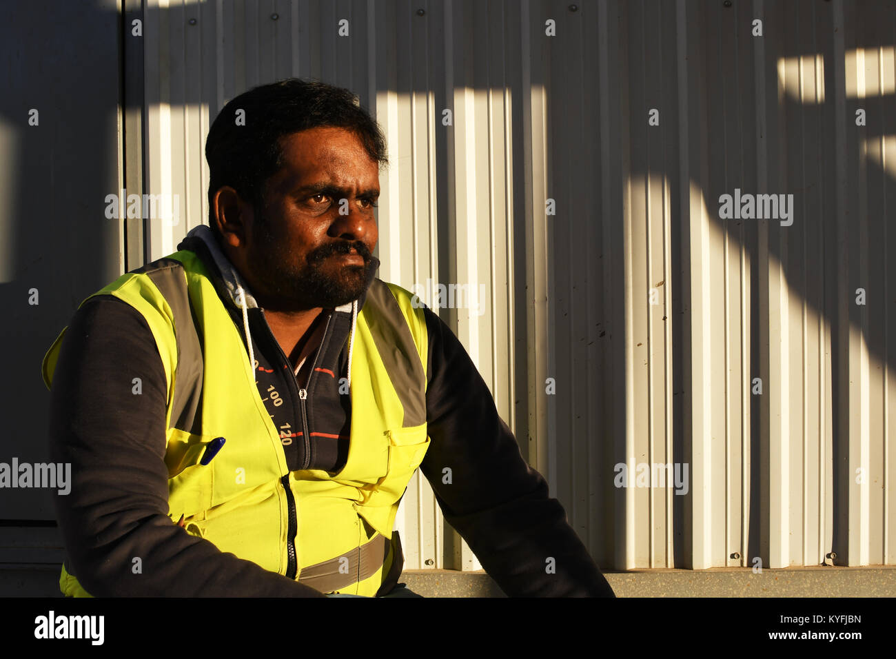 Babujee resting after wotk Stock Photo - Alamy