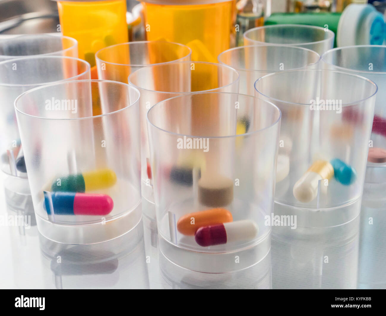 Daily medication at a hospital table, conceptual image Stock Photo - Alamy
