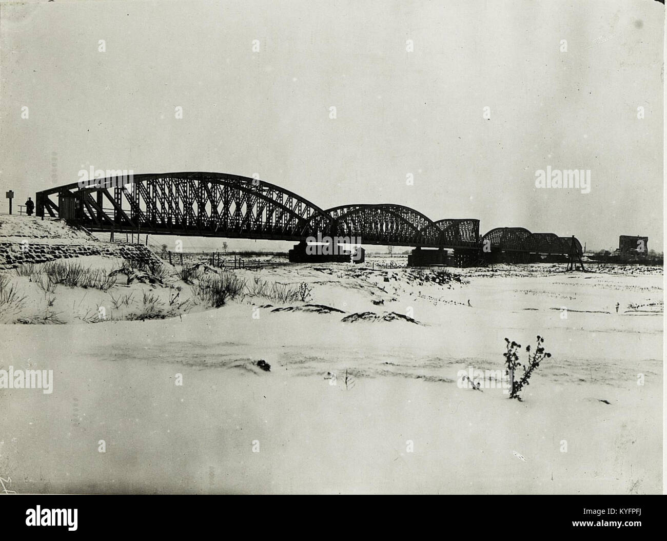 The restored bridge over the Stryj River, shown in this image, reflects ...