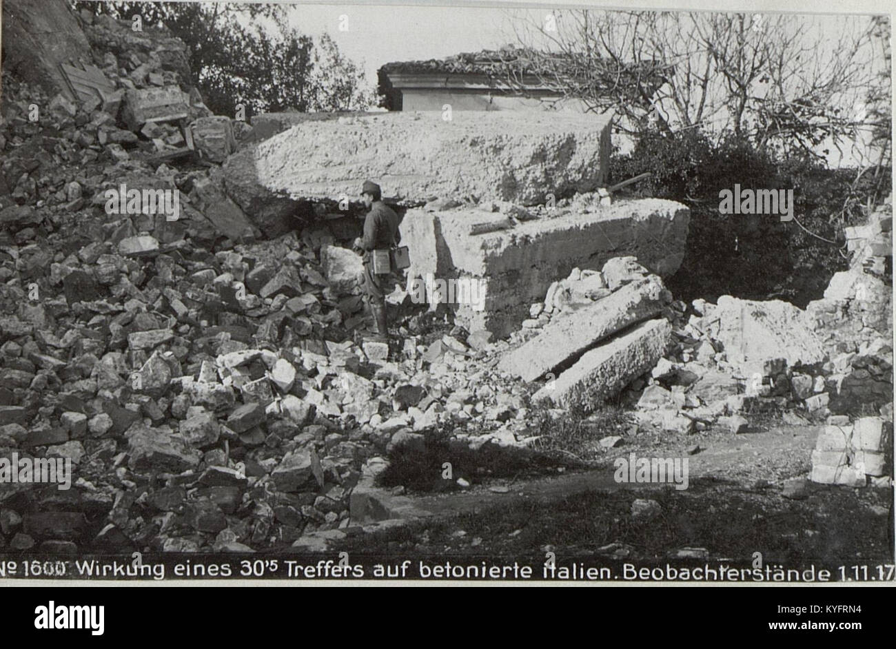 Photograph showing the impact of a 30.5 cm artillery shell on a ...