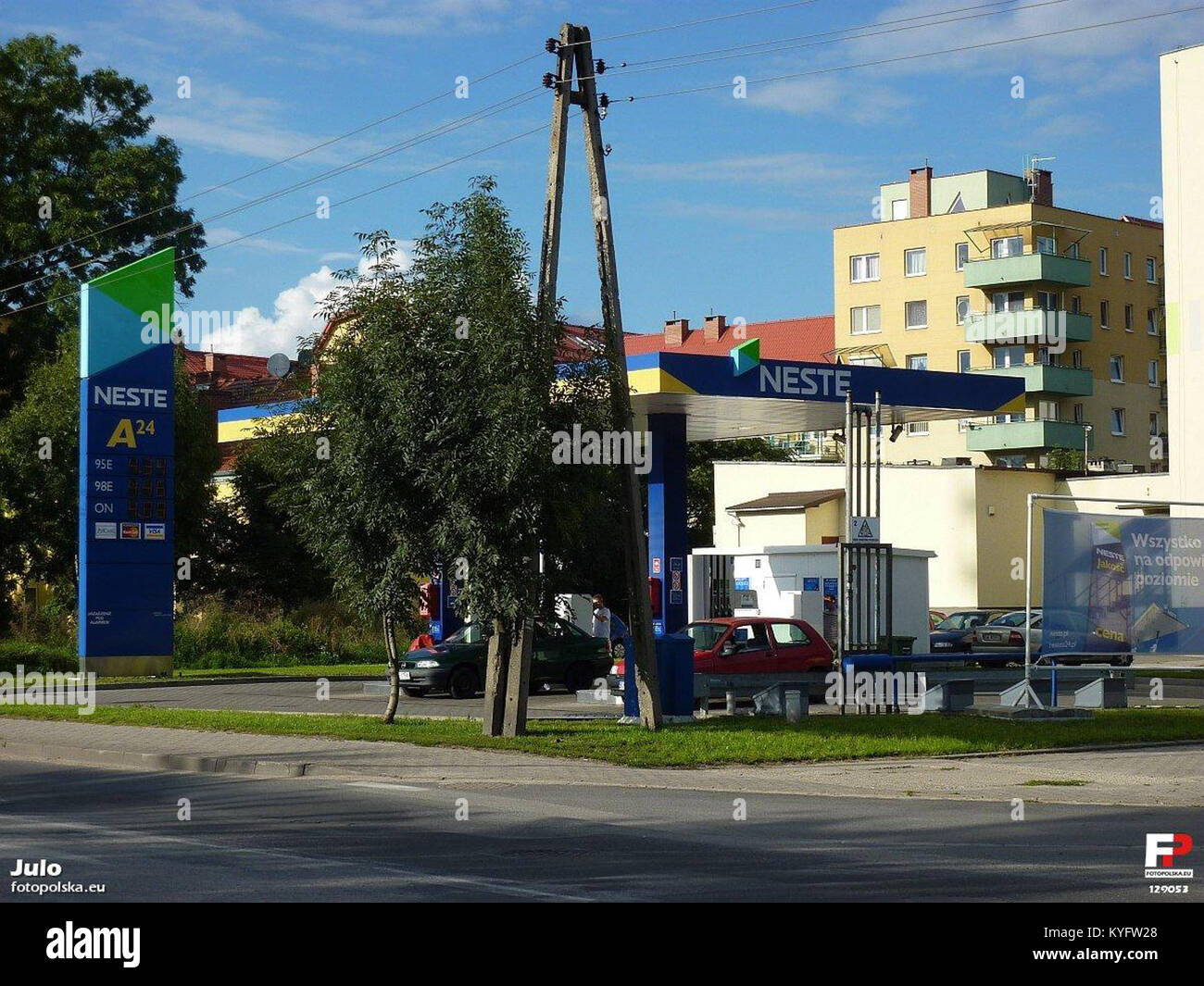 This photograph depicts the Neste gas station in Wrocław, highlighting ...