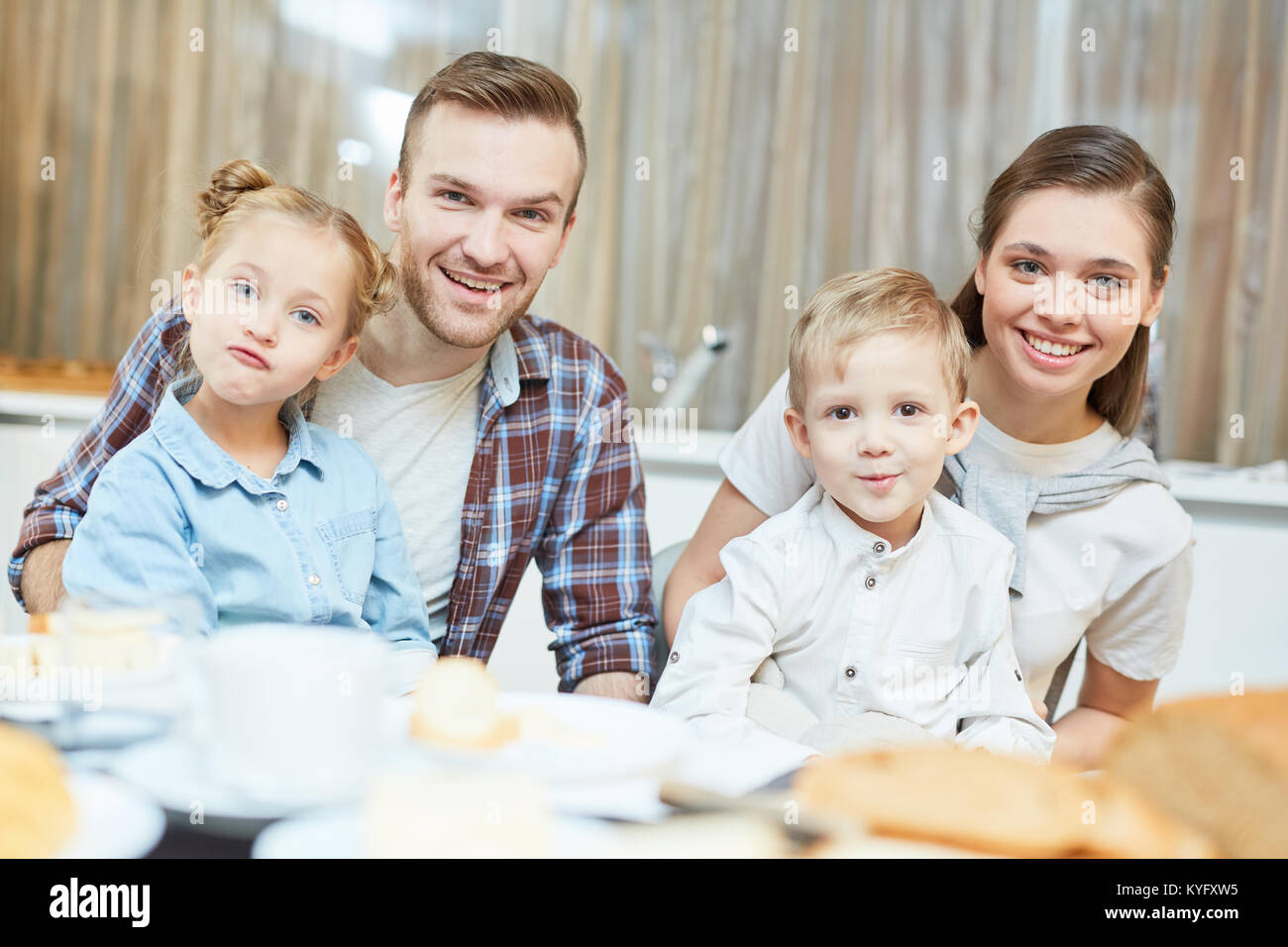 Family of four Stock Photo - Alamy